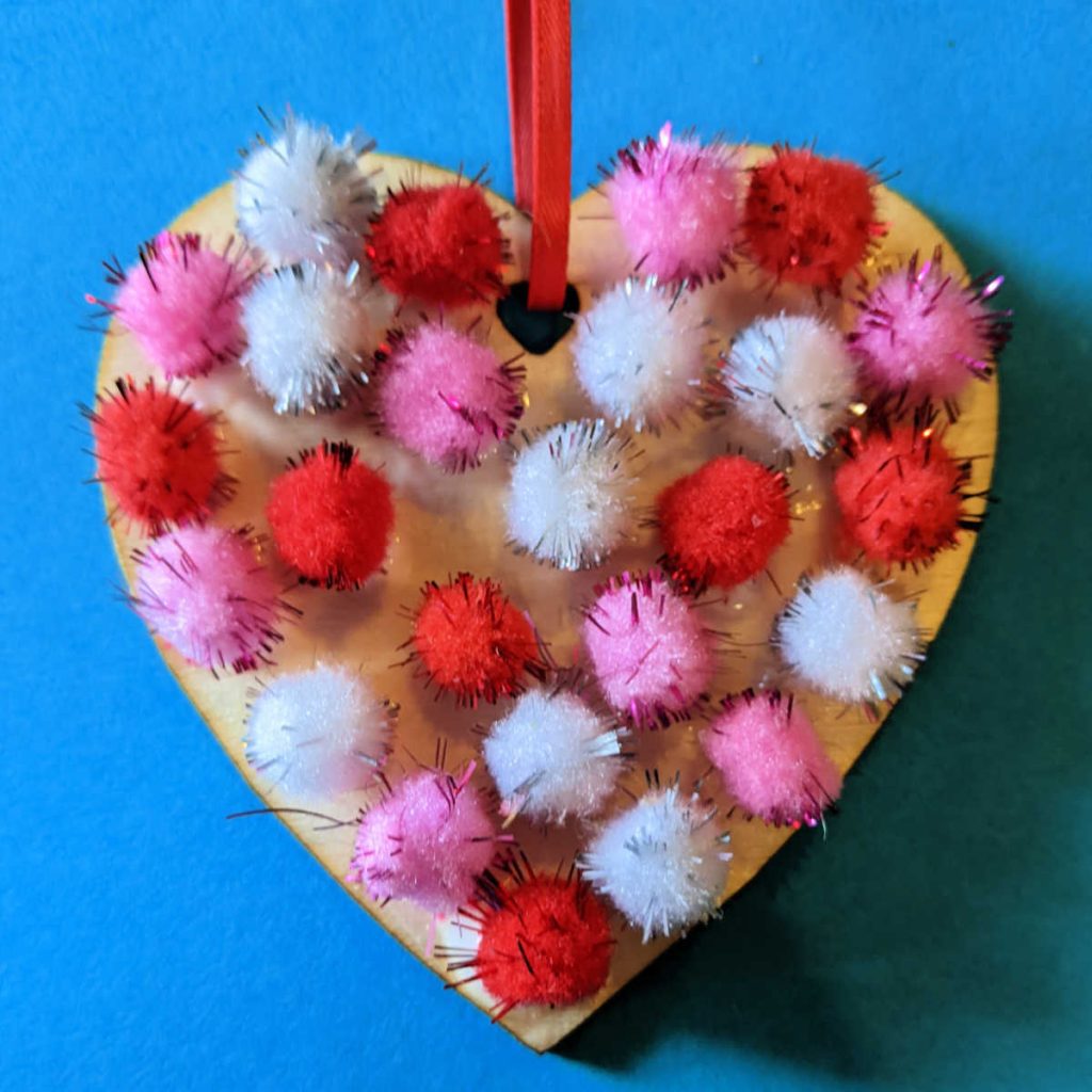 Easy Valentine Pom Pom Craft - Mama Likes This