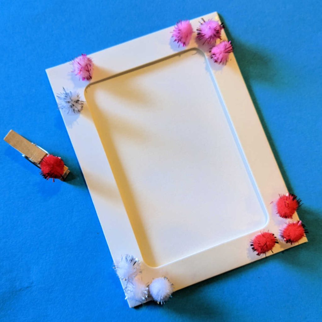 Easy Valentine Pom Pom Picture Frame Craft - Mama Likes This