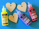 Easy Rainbow Painted Wood Heart Craft - Mama Likes This